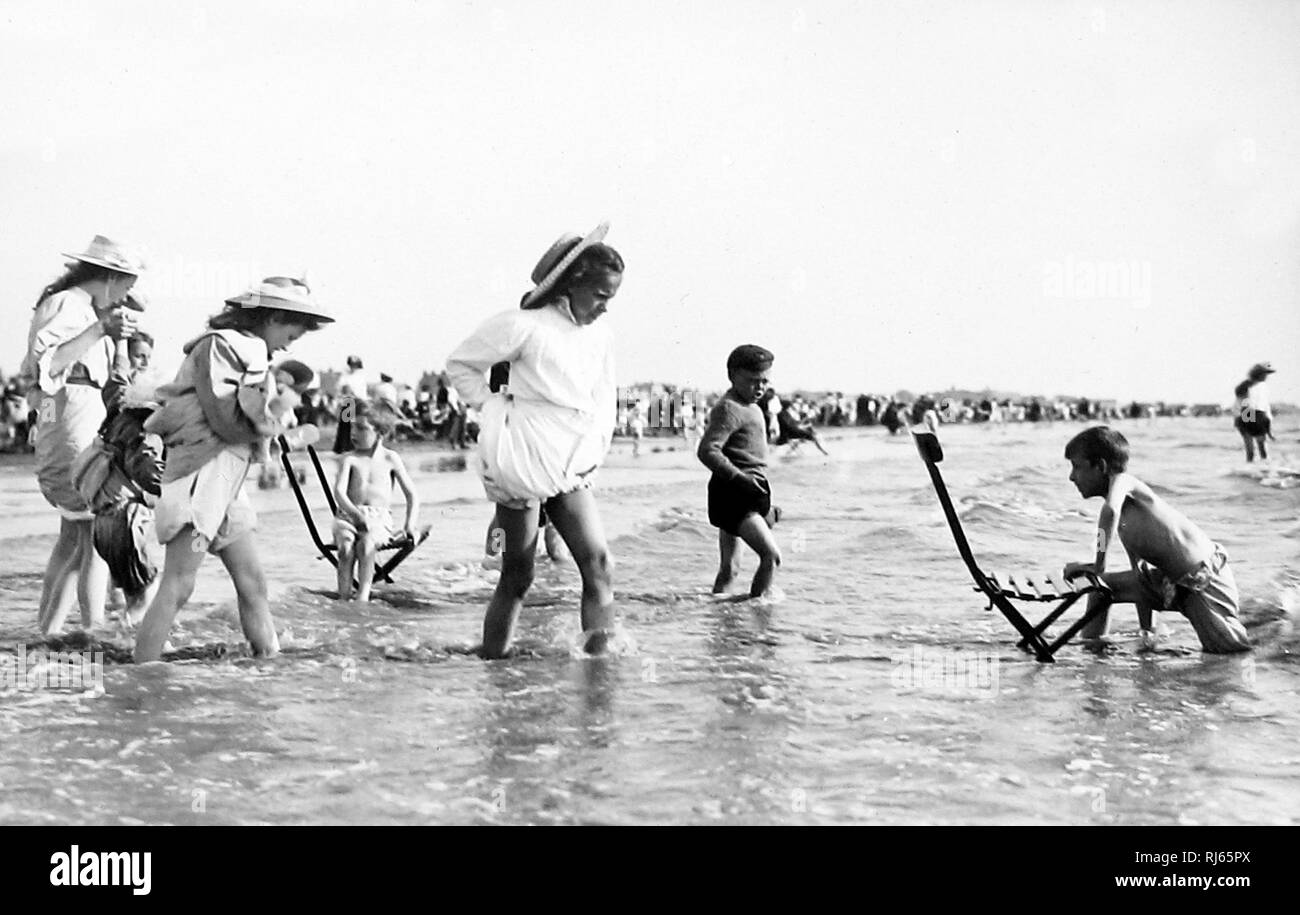 Children playing at the seaside Stock Photo - Alamy