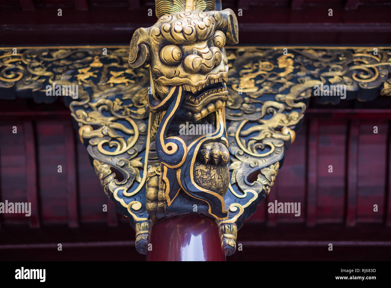 Stone dragon sculpture on a buddhist temple wall in Chengdu, Sichuan ...