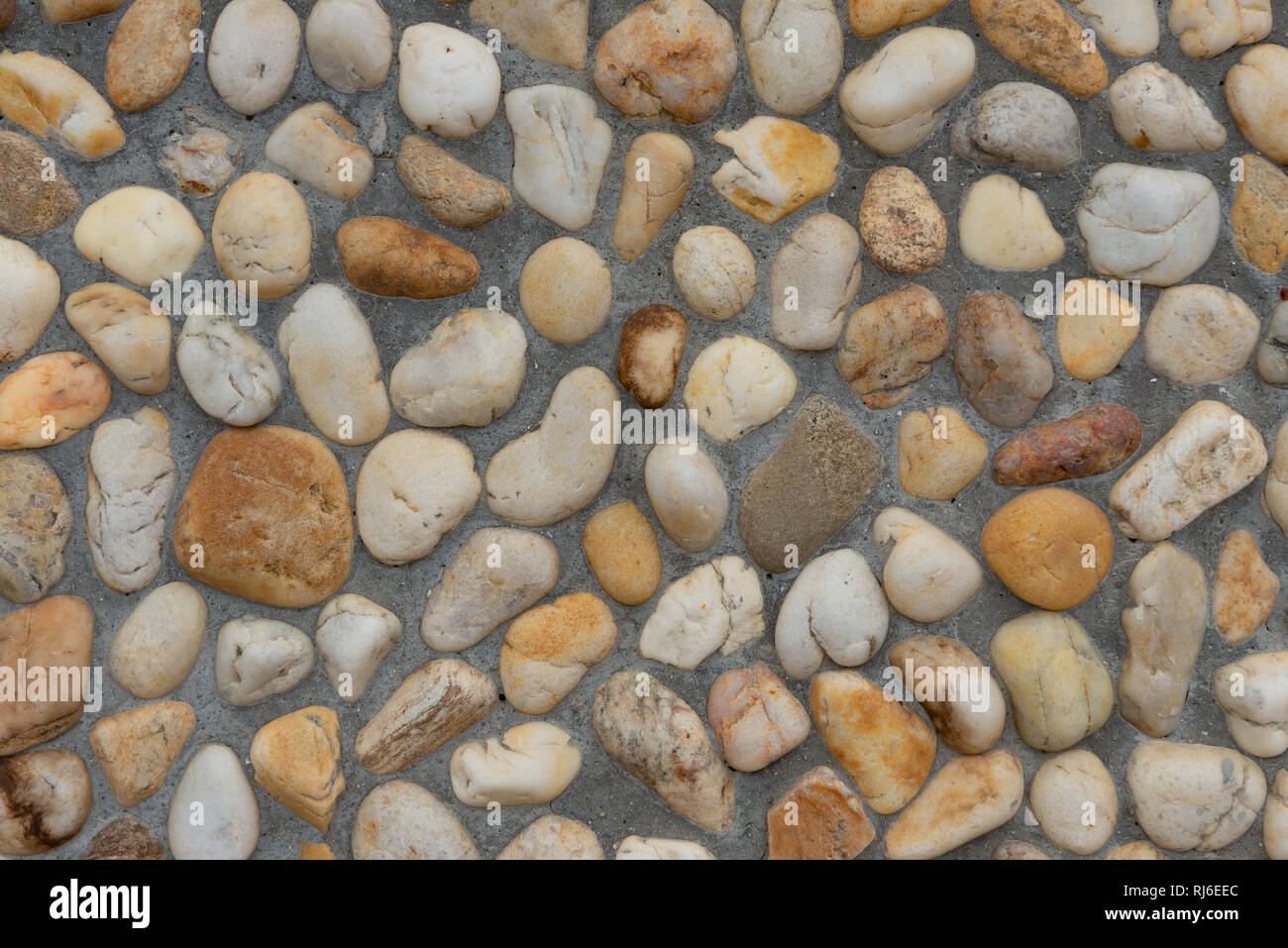 pebbles as background and texture Stock Photo - Alamy