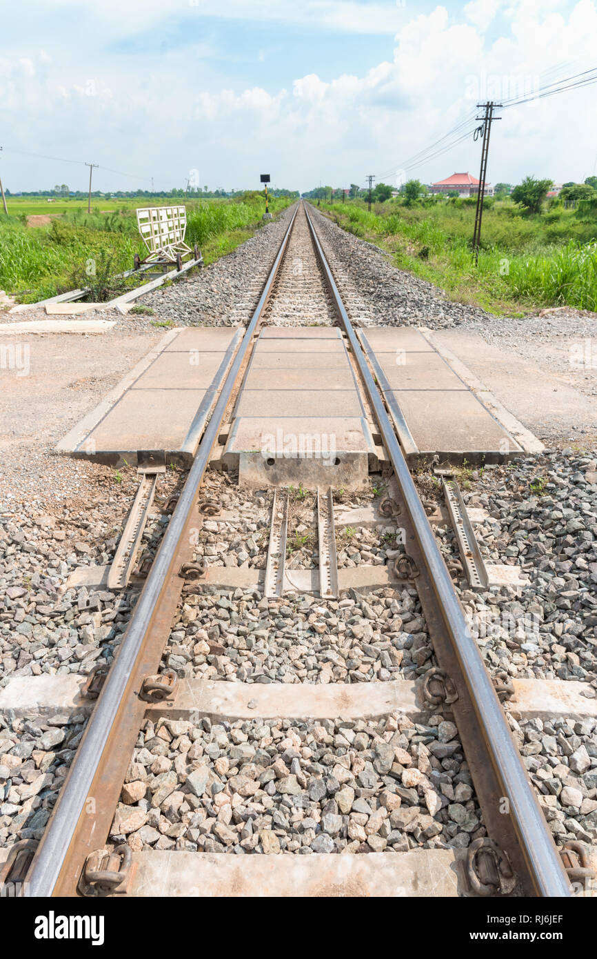 Long straight railroad on concrete sleepers in a rural Stock Photo - Alamy