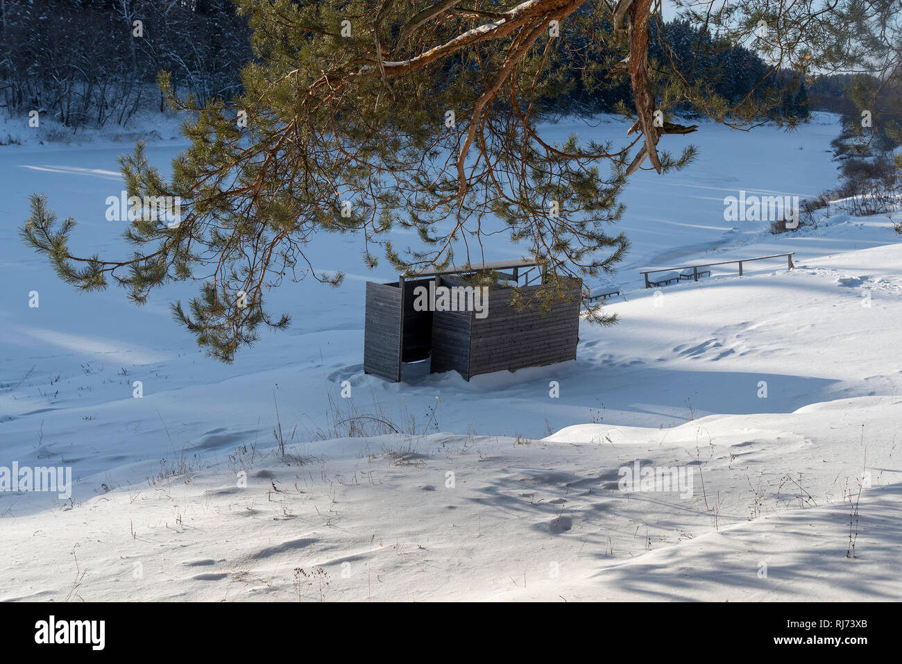 Wooden booth for dressing at the speech on a winter day. The ...