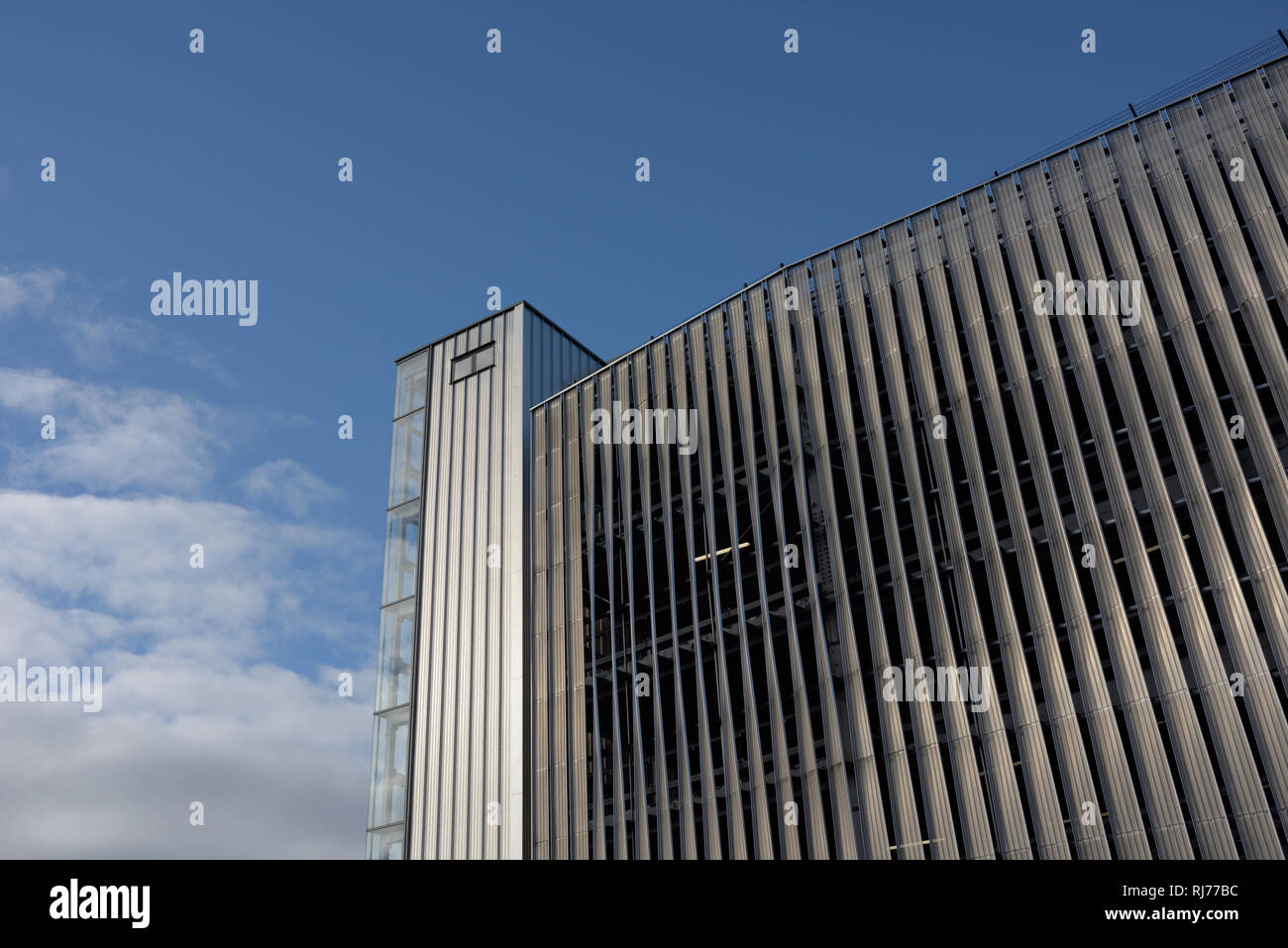 Multi storey car park with metal cladding at the rock triangle mixed ...