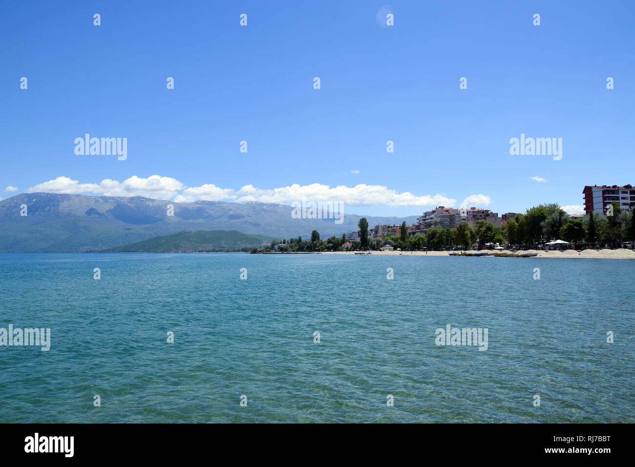 Landscape of Ohrid lake with mountain background. Pogradec, Tushemisht ...