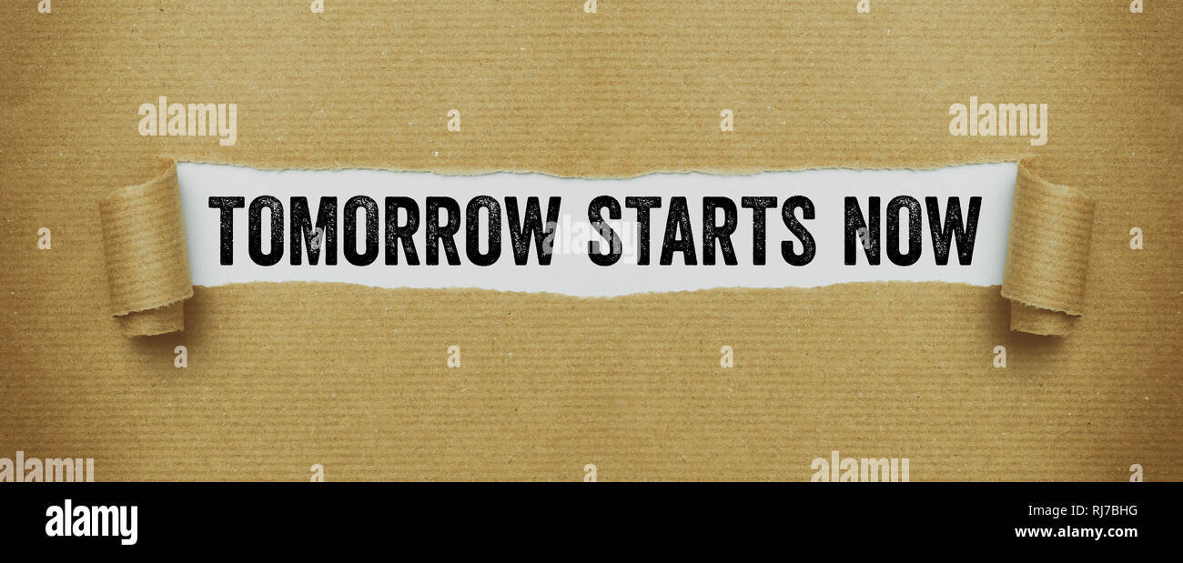 Torn brown paper revealing the words Tomorrow starts now Stock Photo ...