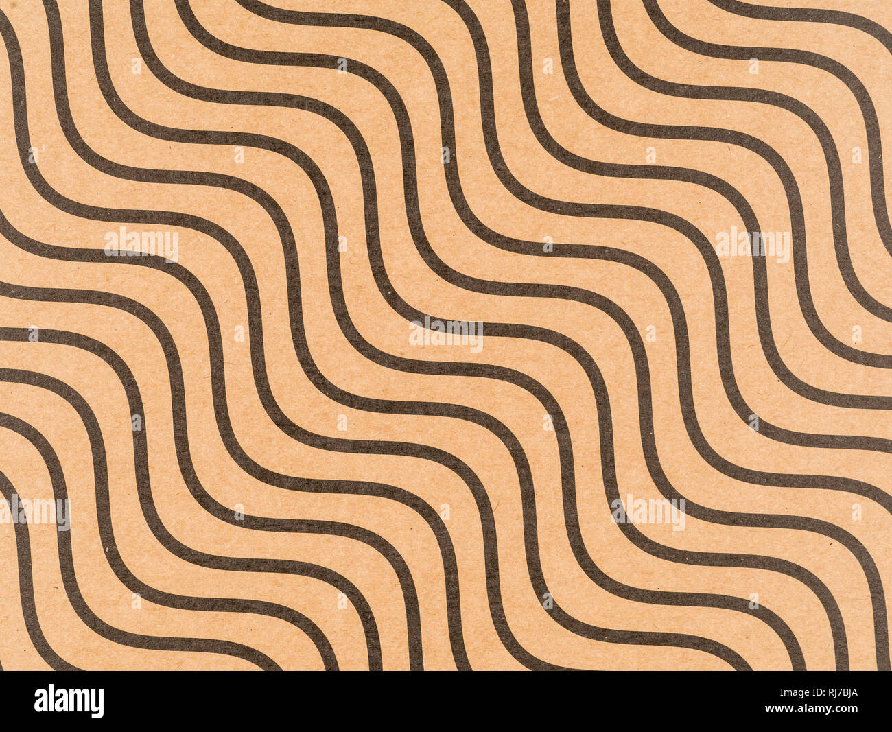 Brown craft paper with a wavy line pattern Stock Photo - Alamy