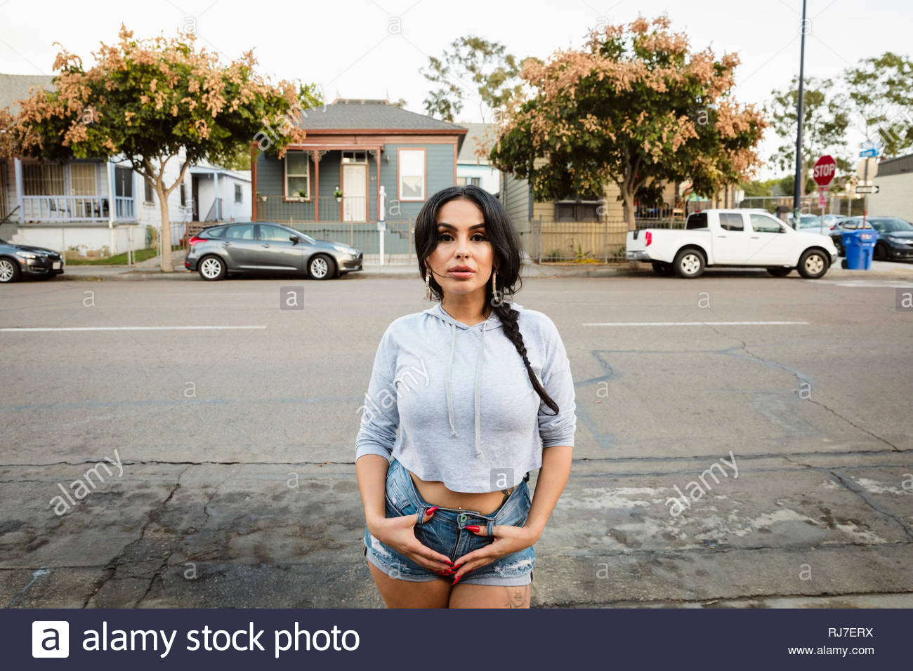 Latina woman street shorts hi-res stock photography and images - Alamy