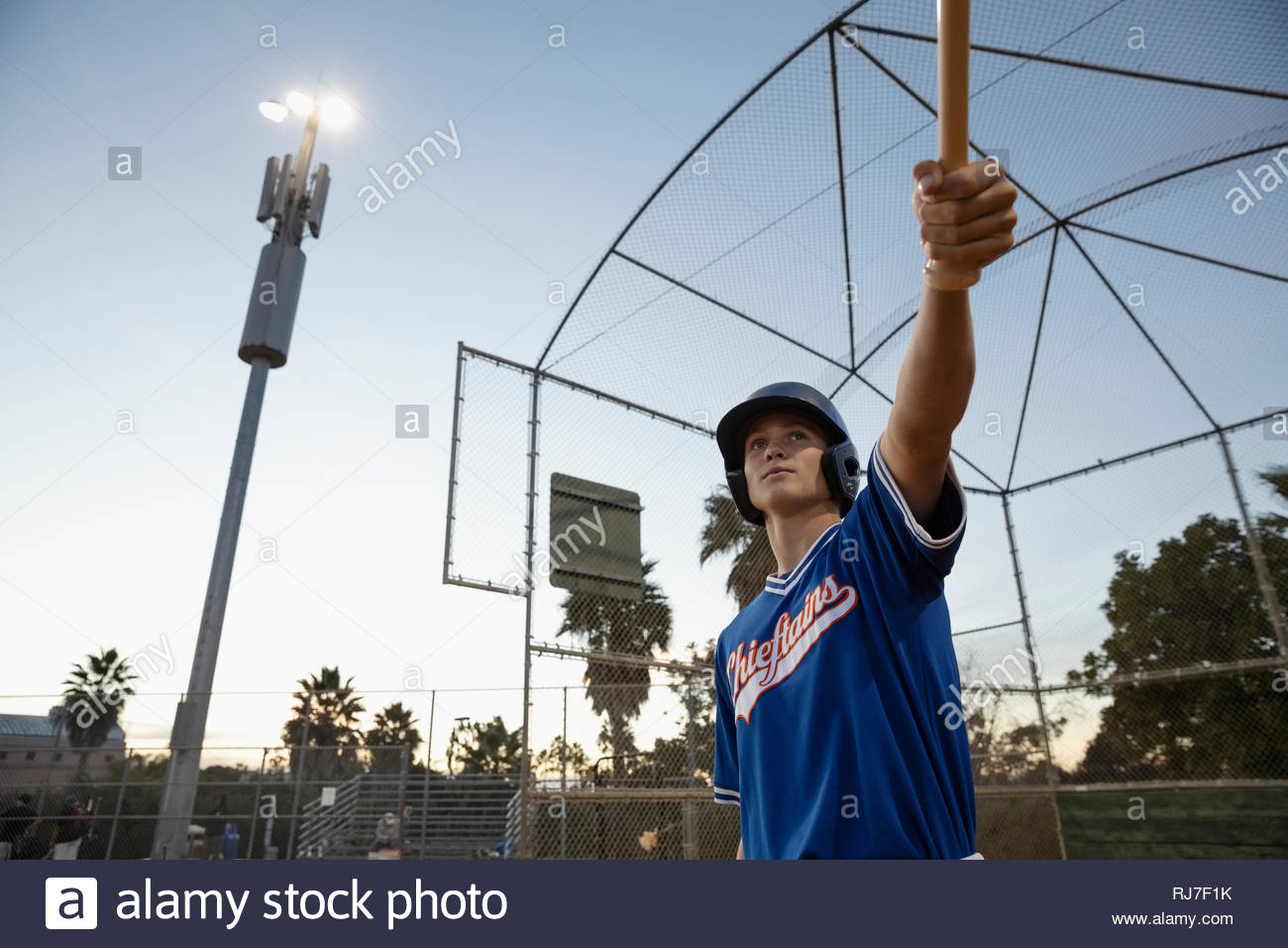 Boy holding baseball bat hi-res stock photography and images - Alamy