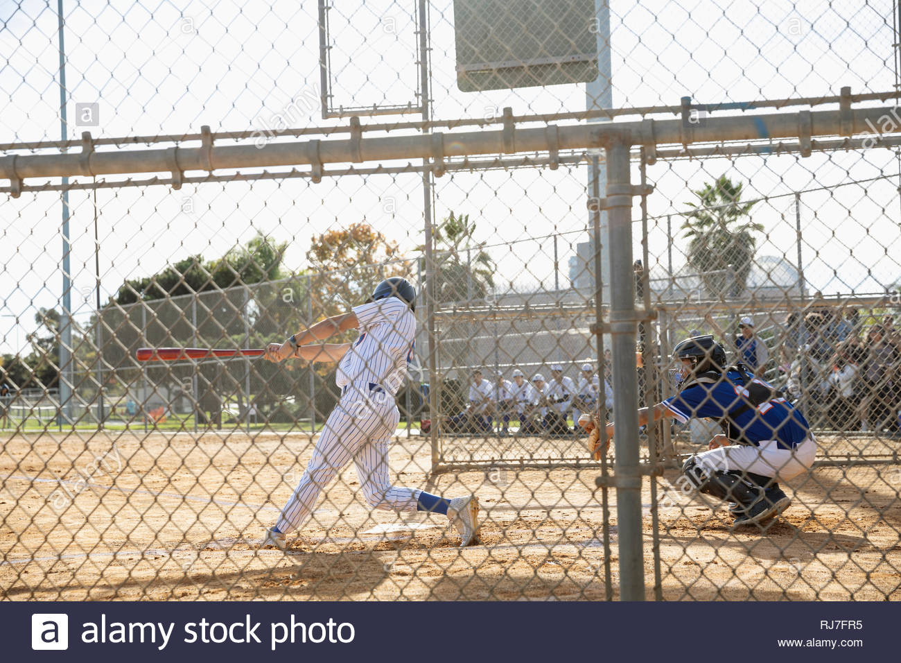 Baseball player swinging a bat people hi-res stock photography and ...