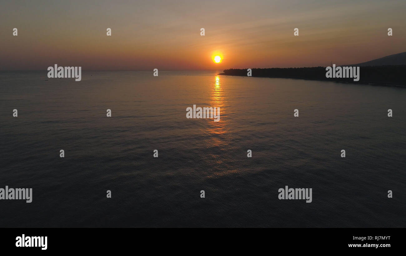aerial view sunrise over ocean. seascape colorful sunrise over sea at ...