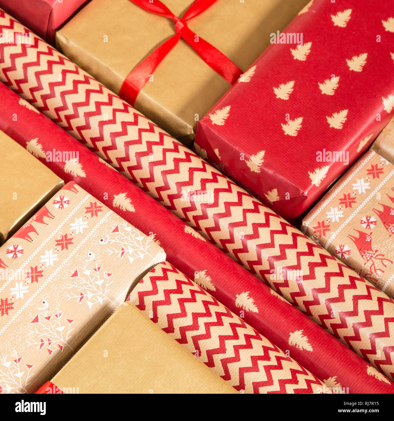 Decorative wrapping papers and the Christmas presents Stock Photo - Alamy