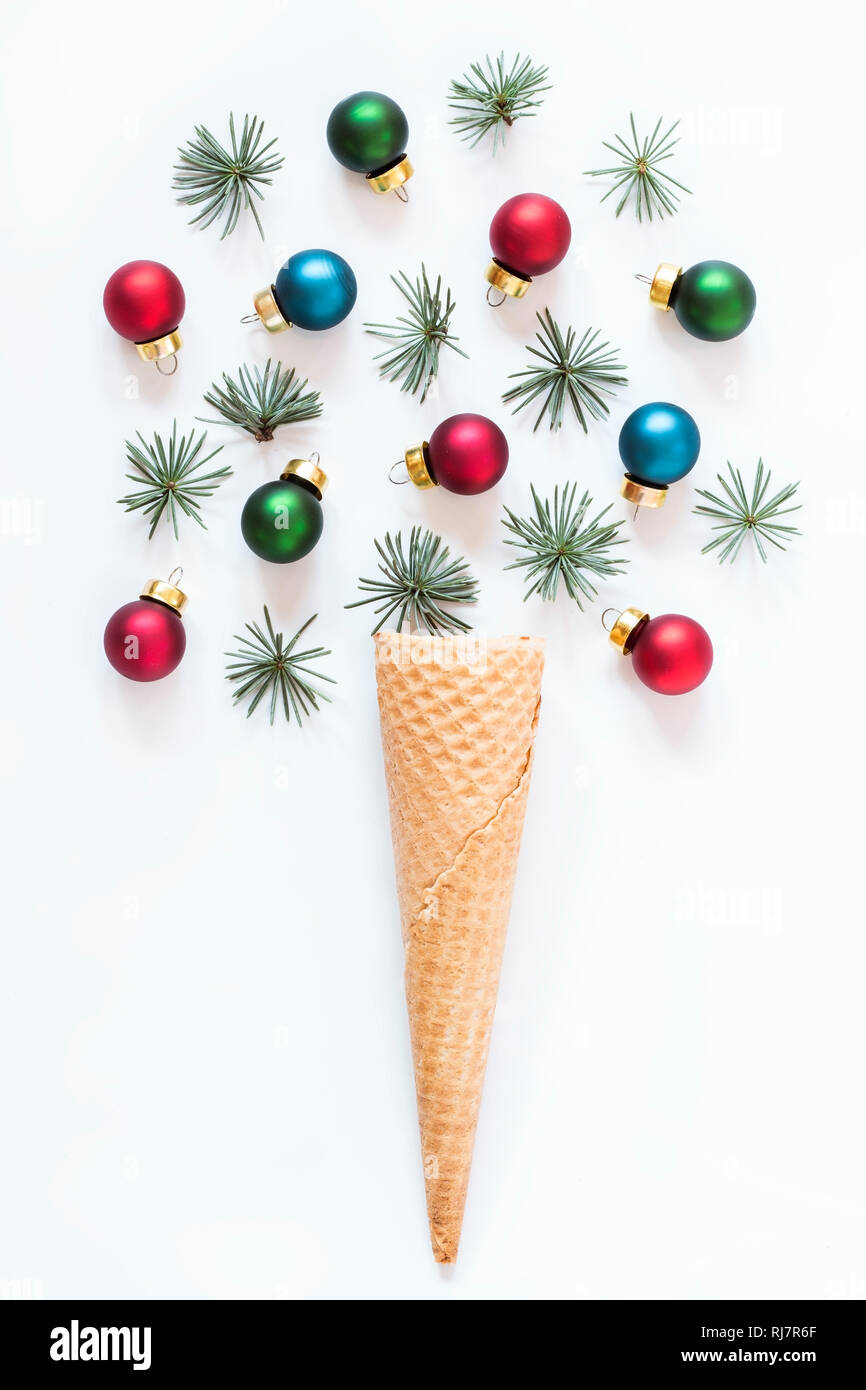 Colorful holiday baubles in a cornet on white background Stock Photo ...