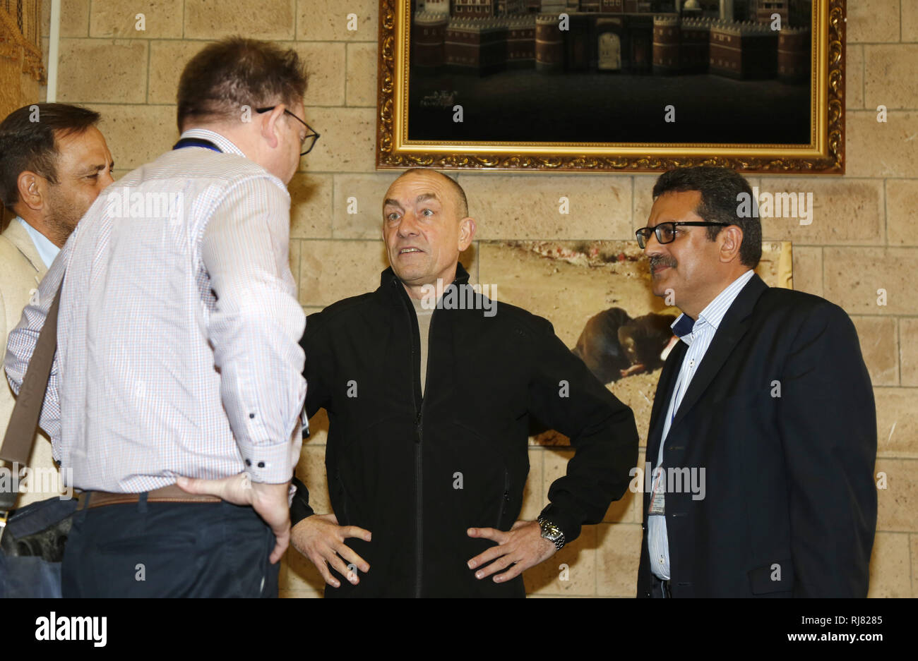 Sanaa, Yemen. 5th Feb, 2019. Michael Anker Lollesgaard (2nd R) talks to ...