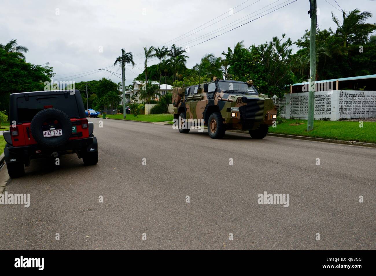 Bushmaster army vehicle in a suburban street hi-res stock photography ...
