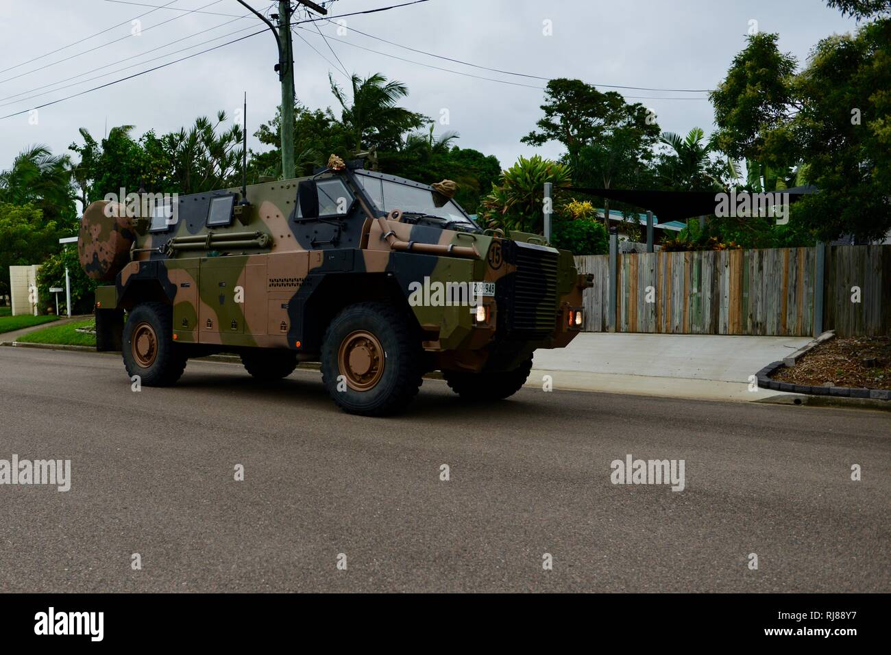 Bushmaster army vehicle in a suburban street, Townsville, Queensland ...