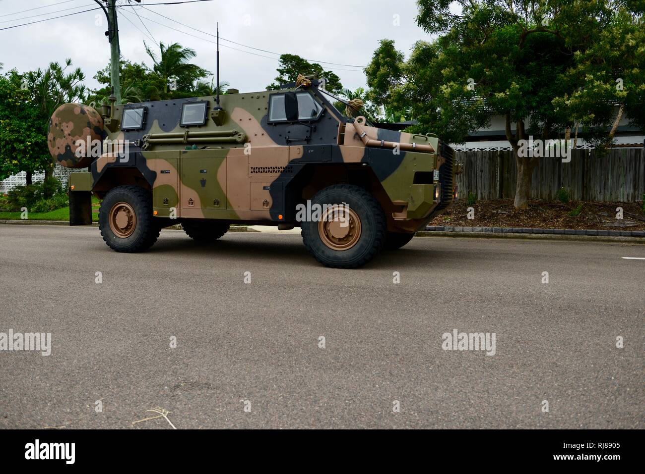 Bushmaster army vehicle in a suburban street, Townsville, Queensland ...