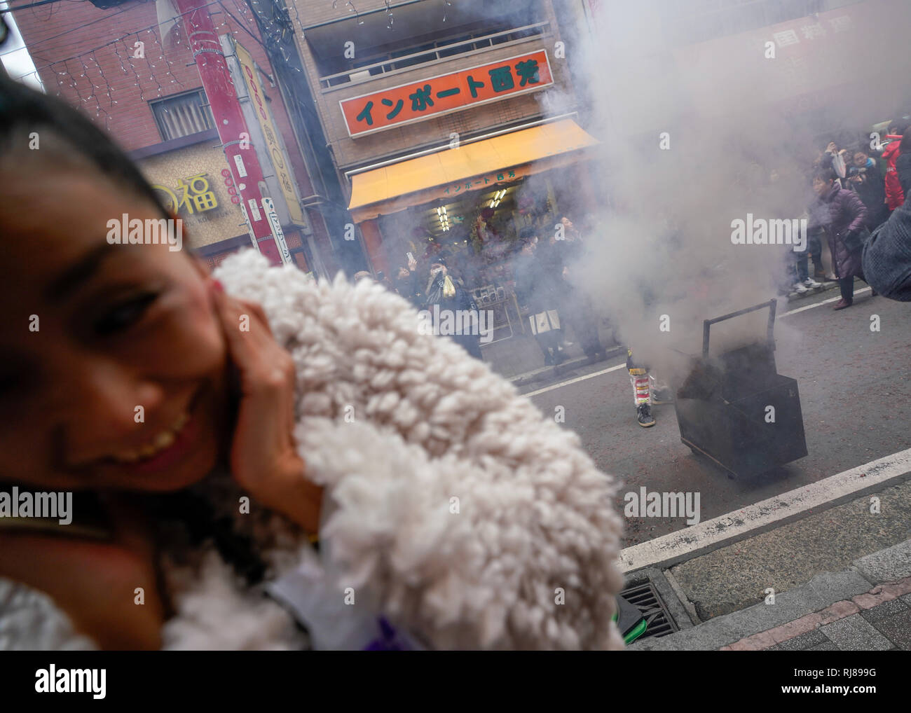 Yokohama, Japan. 5th Feb, 2019. Firecrackers go off inside a metal cage ...