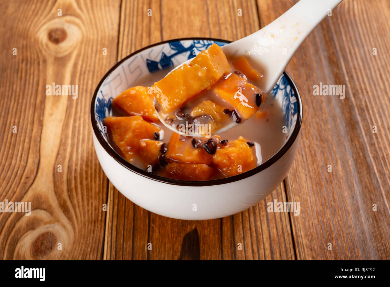 Chinese syrup of sweet potato and purple rice with lily bulbs Stock ...