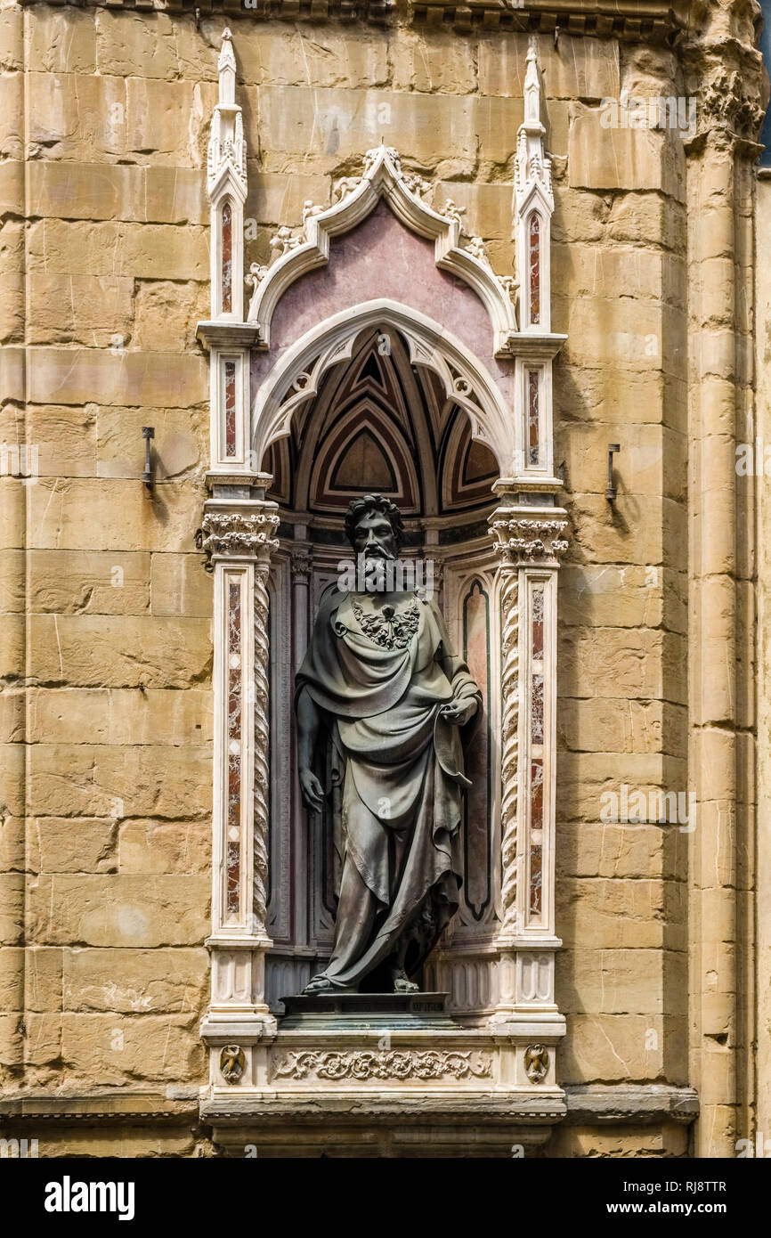 Rock carved sculptures included in the facade of a building Stock Photo ...