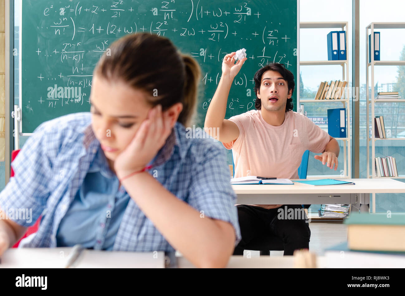 Throwing book classroom hi-res stock photography and images - Alamy