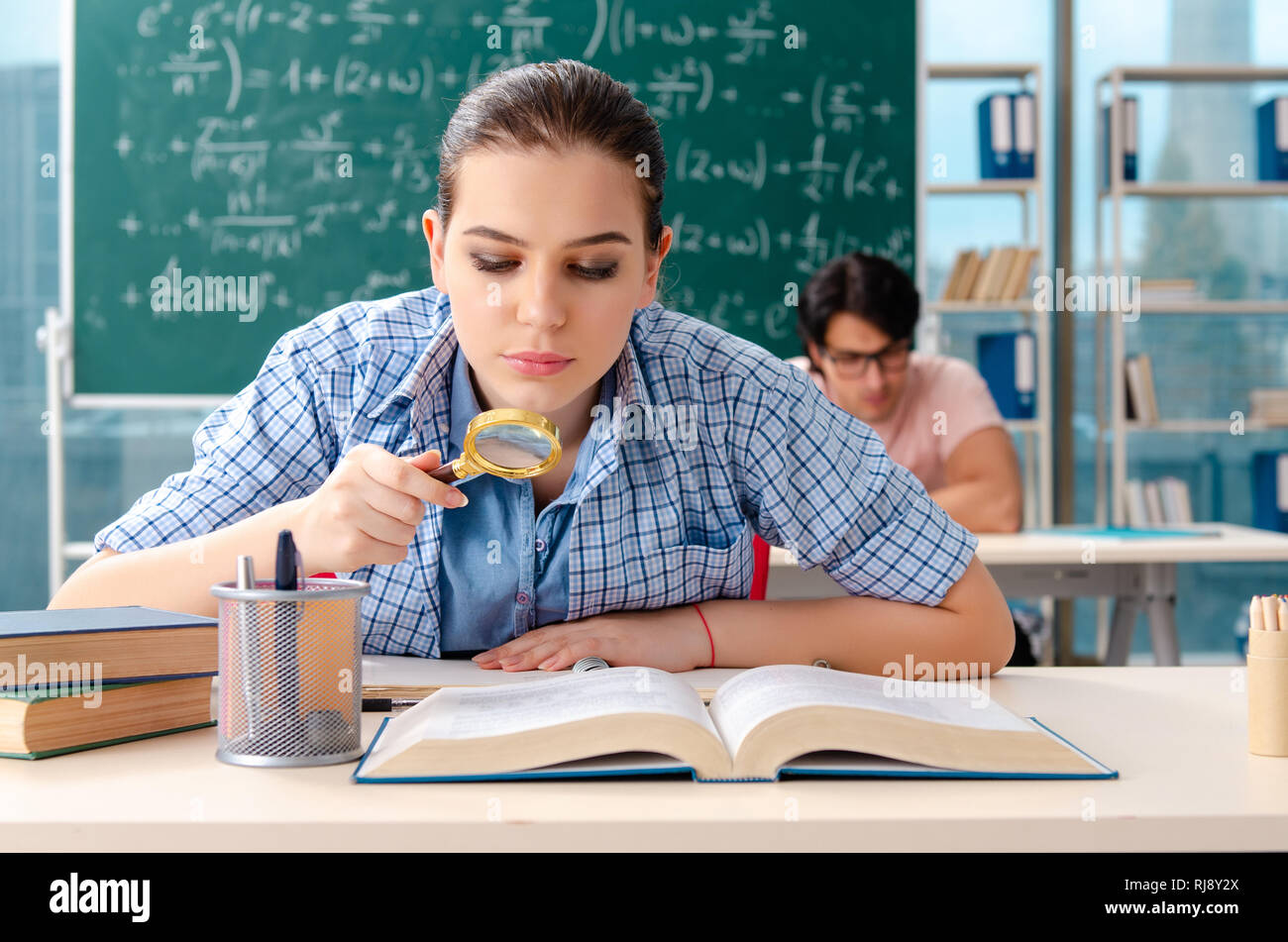 Young students taking the math exam in classroom Stock Photo - Alamy