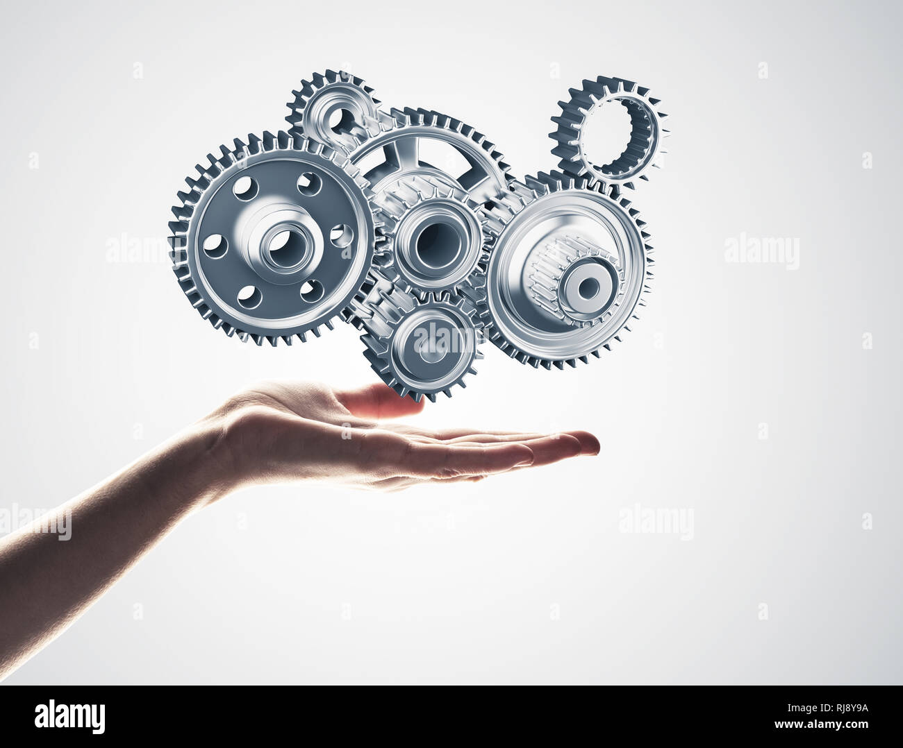 Concept of teamwork and cooperation presented with working gear engine ...