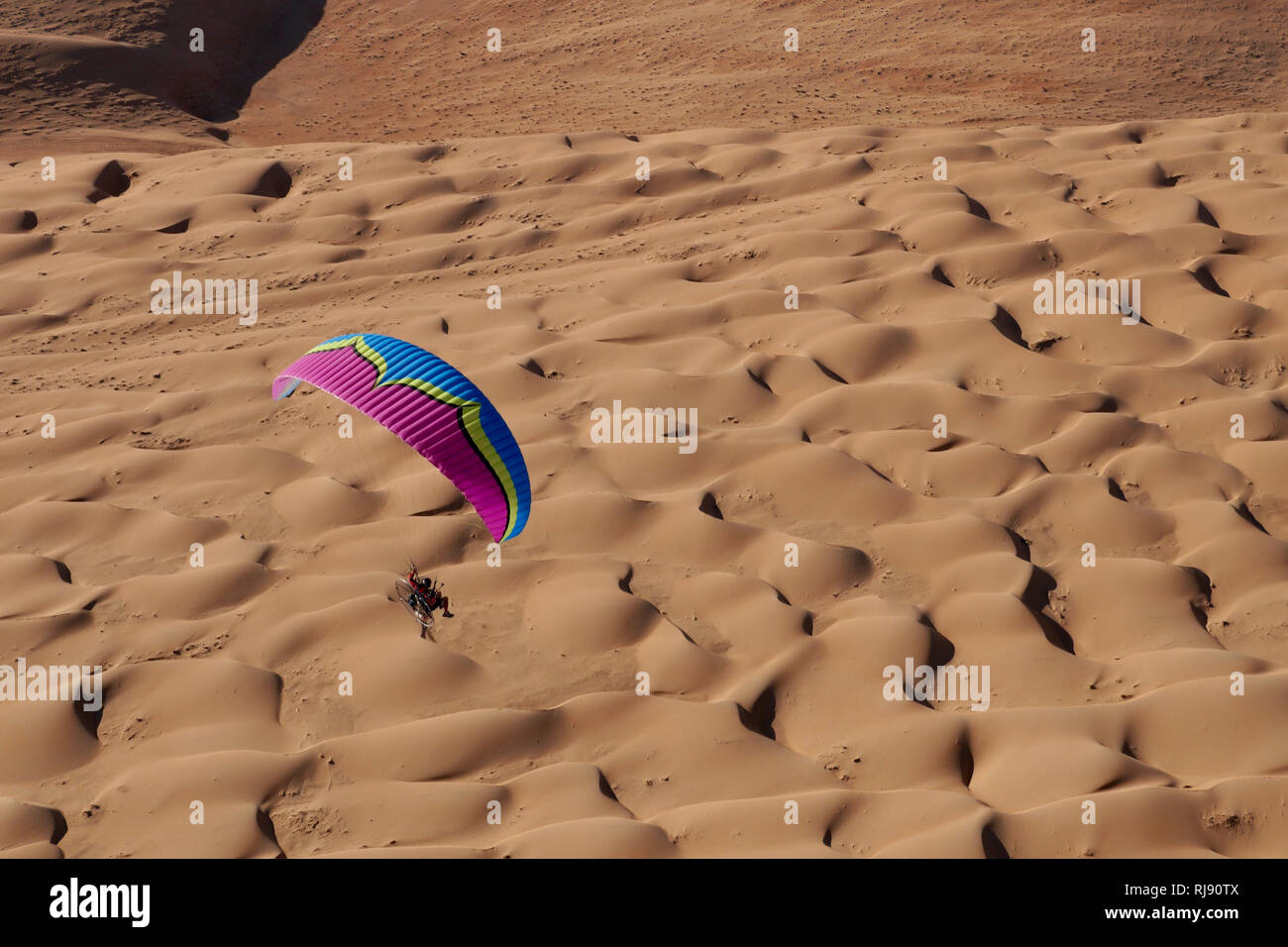 paramotor pilots flying the coast of Oman Stock Photo - Alamy
