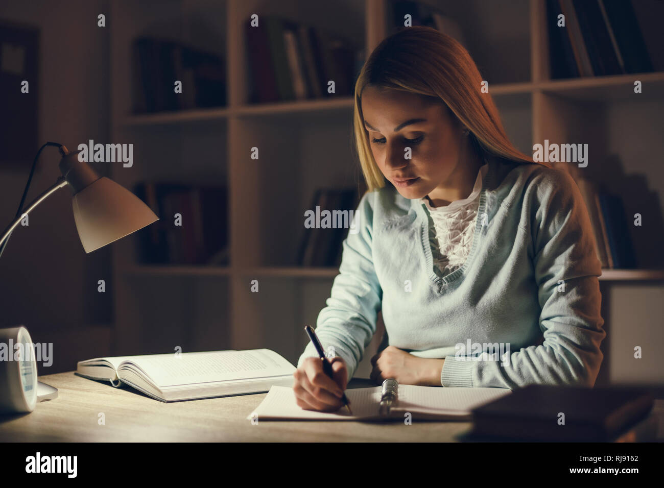 Student learning at home Stock Photo - Alamy