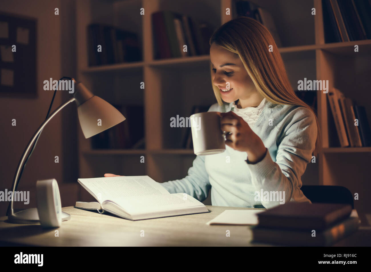 Student learning at home Stock Photo - Alamy