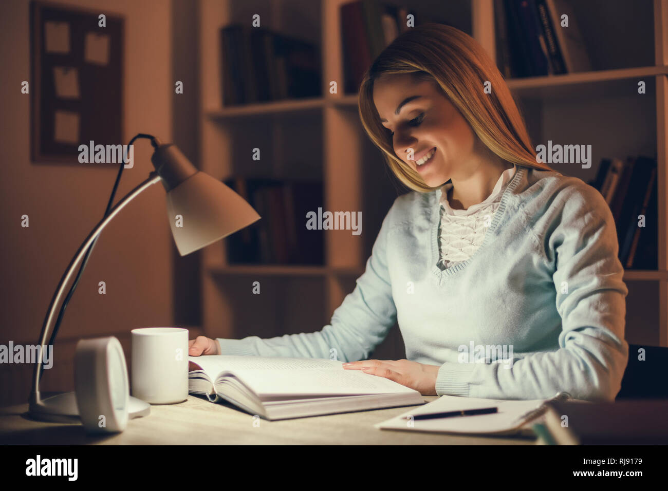 Student learning at home Stock Photo - Alamy