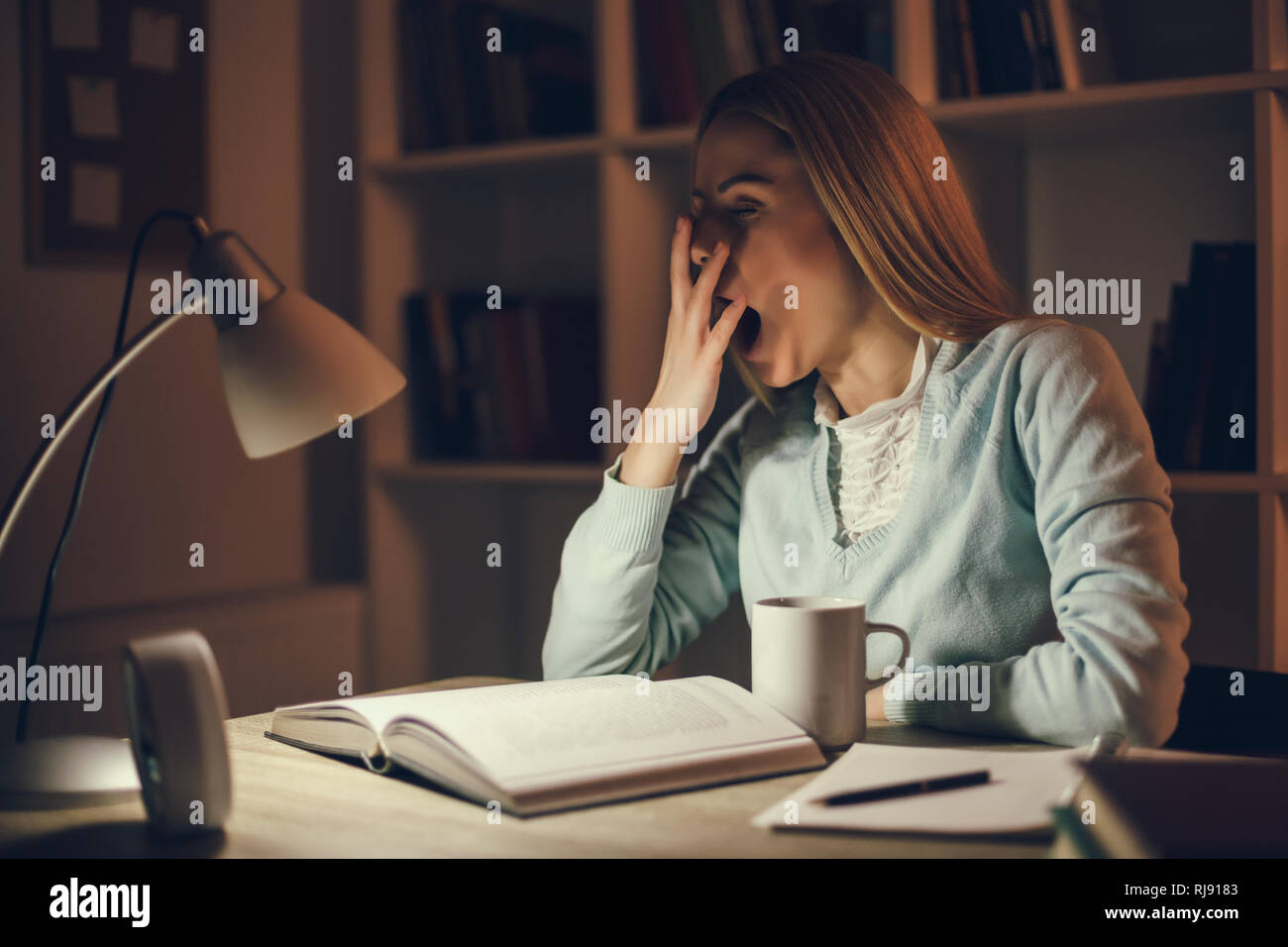 Learning tired book hi-res stock photography and images - Alamy
