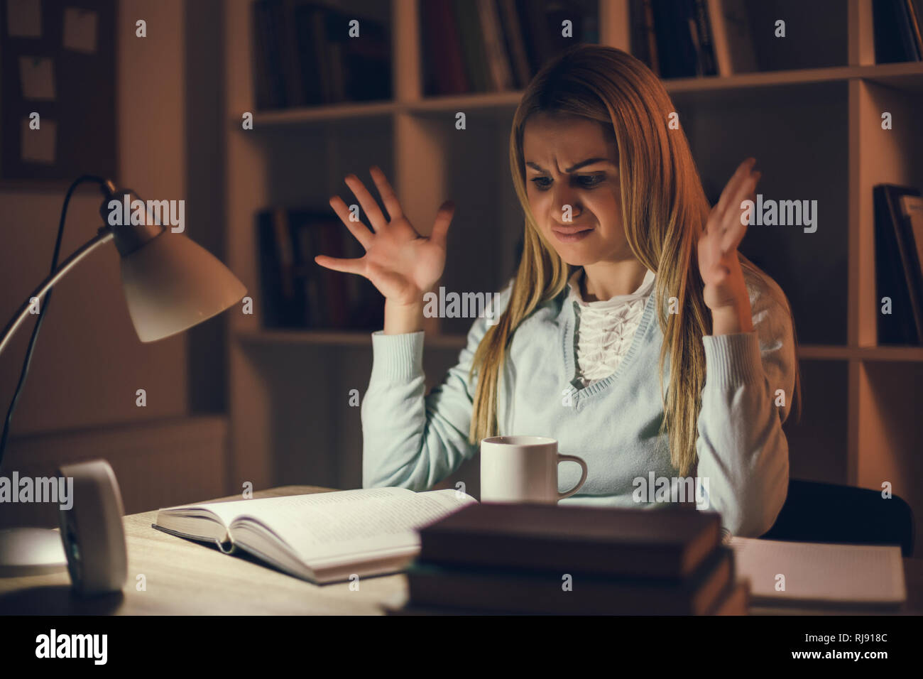 Student studying late night hi-res stock photography and images - Alamy