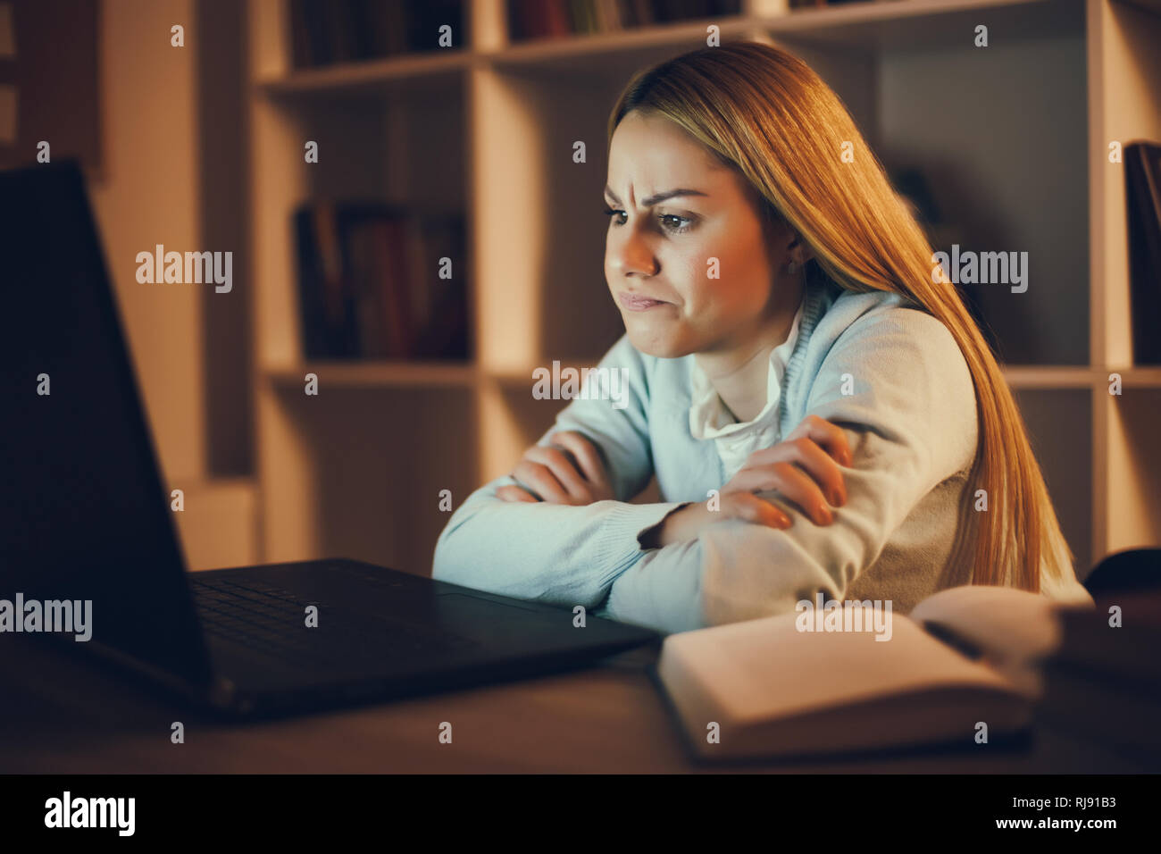 Student learning at home. Watching online course Stock Photo - Alamy
