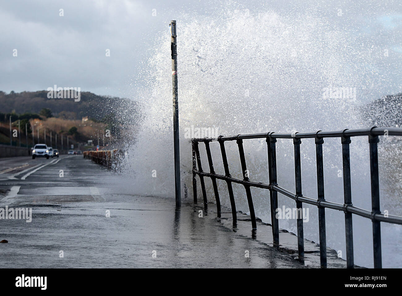 Waves crash into the promenade at Colwyn Bay as high winds bring ...