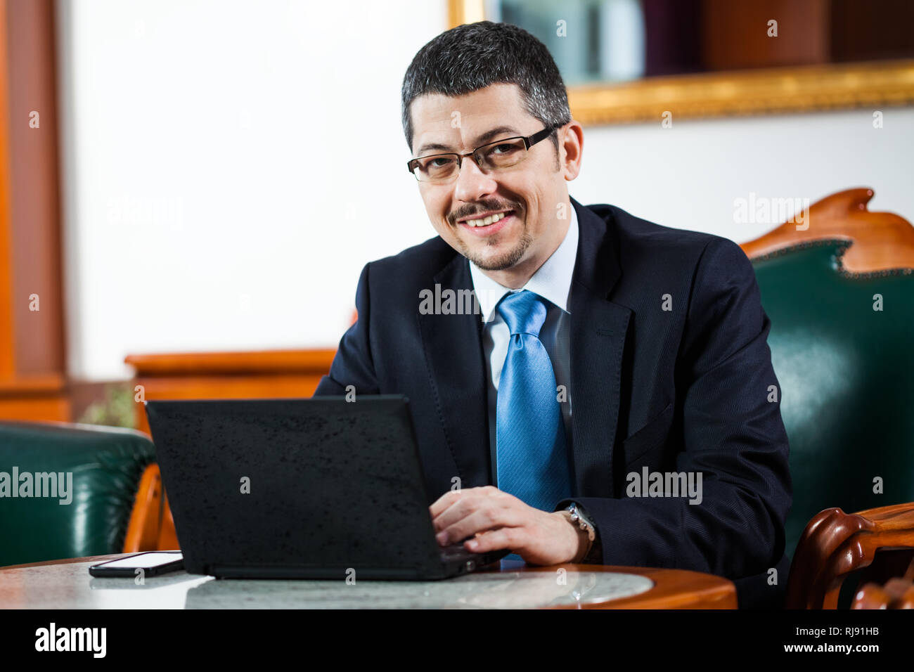Male office manager using hi-res stock photography and images - Alamy