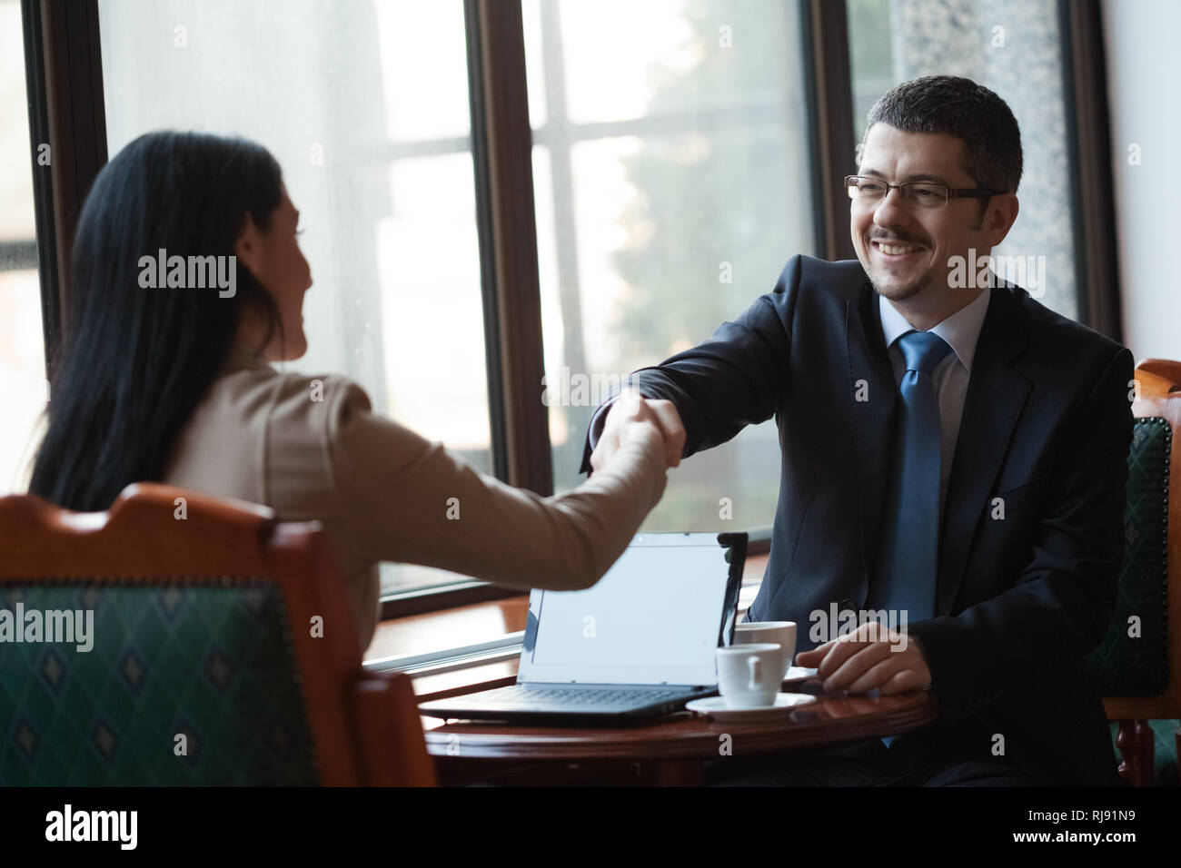 Business people reaching agreement Stock Photo - Alamy