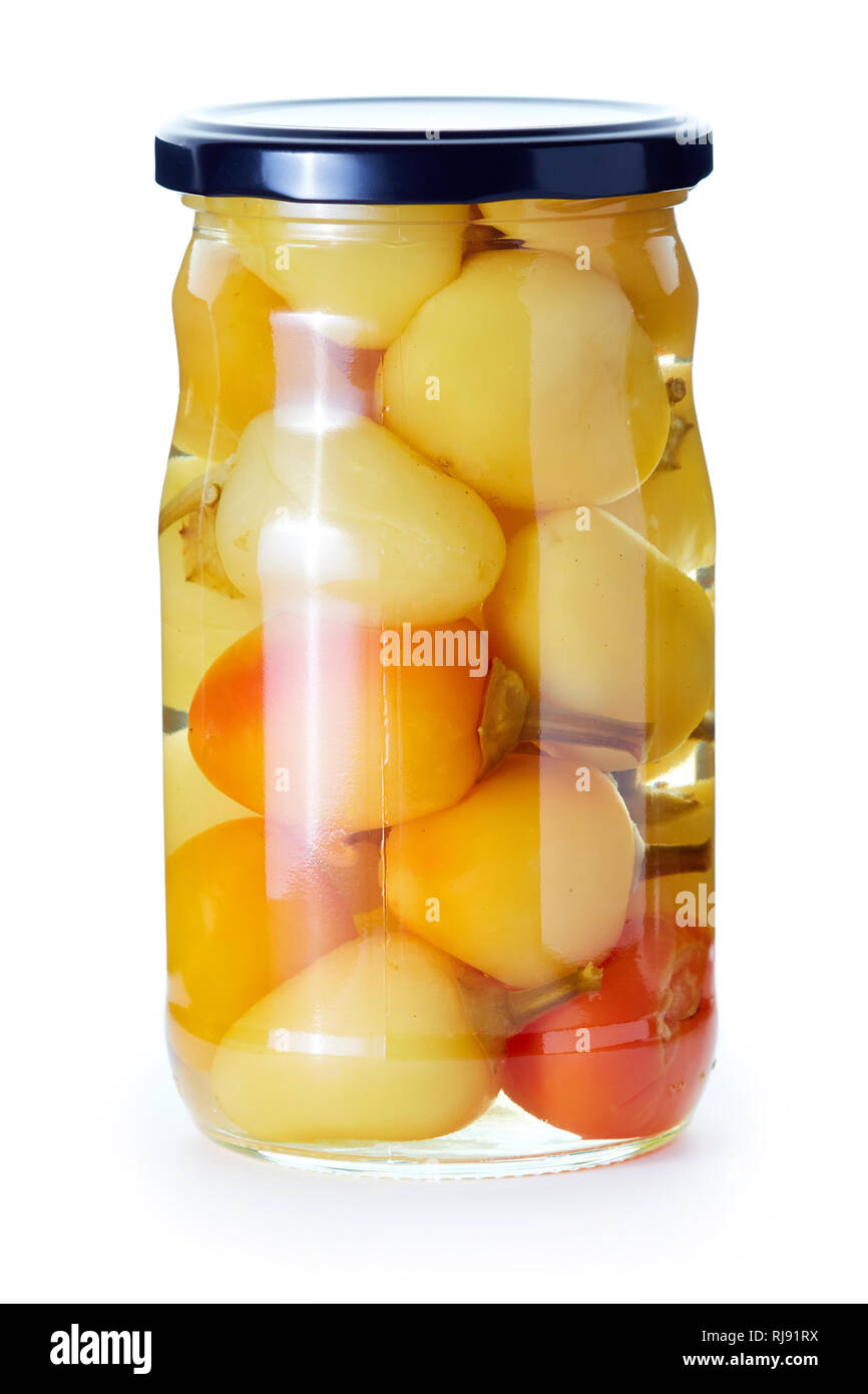 Pickled preserved bell peppers in a jar isolated on white background ...