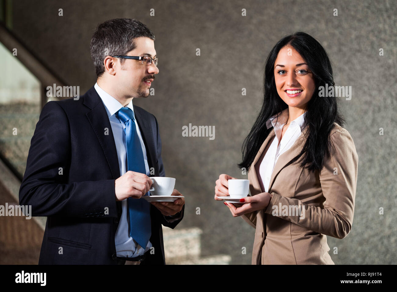Business people talking Stock Photo - Alamy