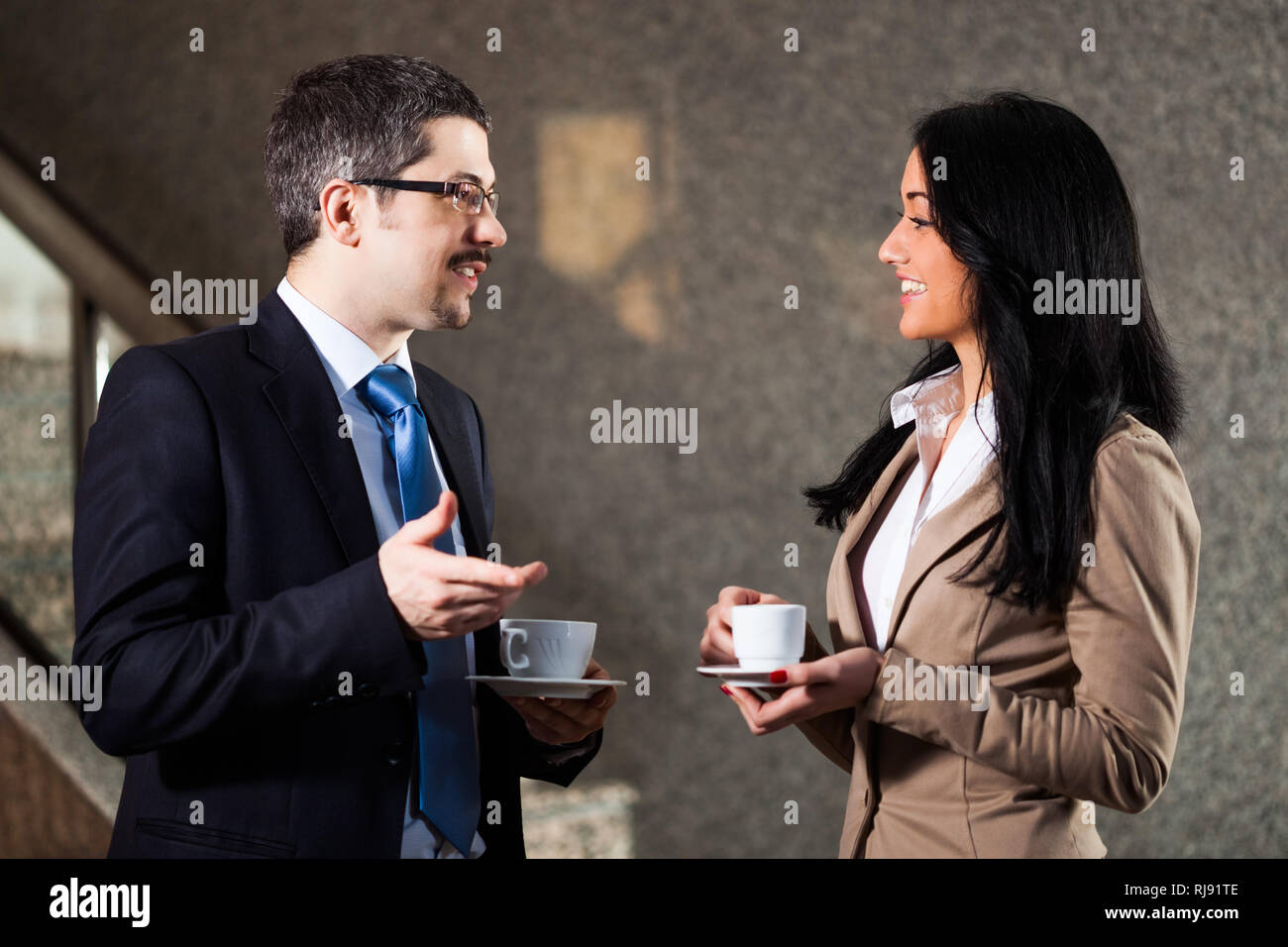 Business people talking Stock Photo - Alamy