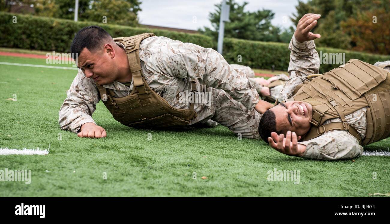 Marine Cpl. Julio C. Tejedamatos drags Marine Cpl. Jared E. Davidso ...