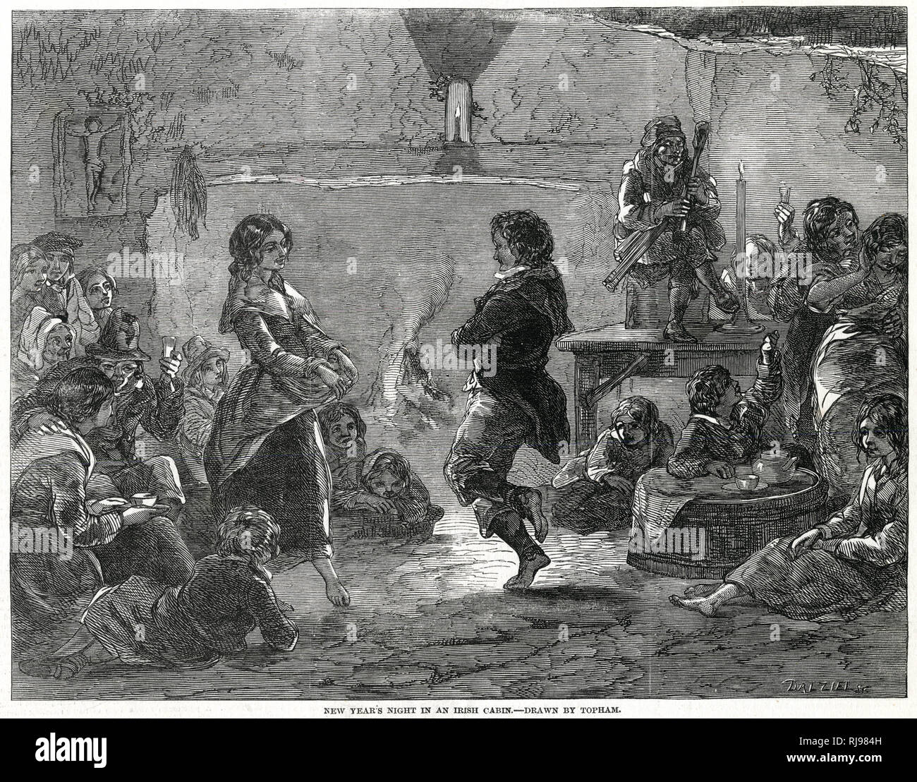 Irish folk celebrate the New Year by dancing a jig in a cabin Stock ...
