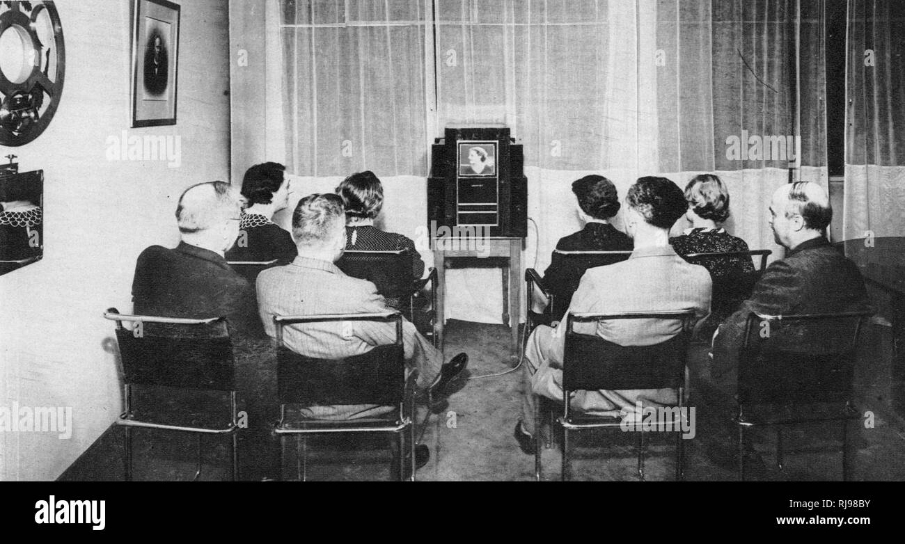 Watching entertainment Black and White Stock Photos & Images - Alamy