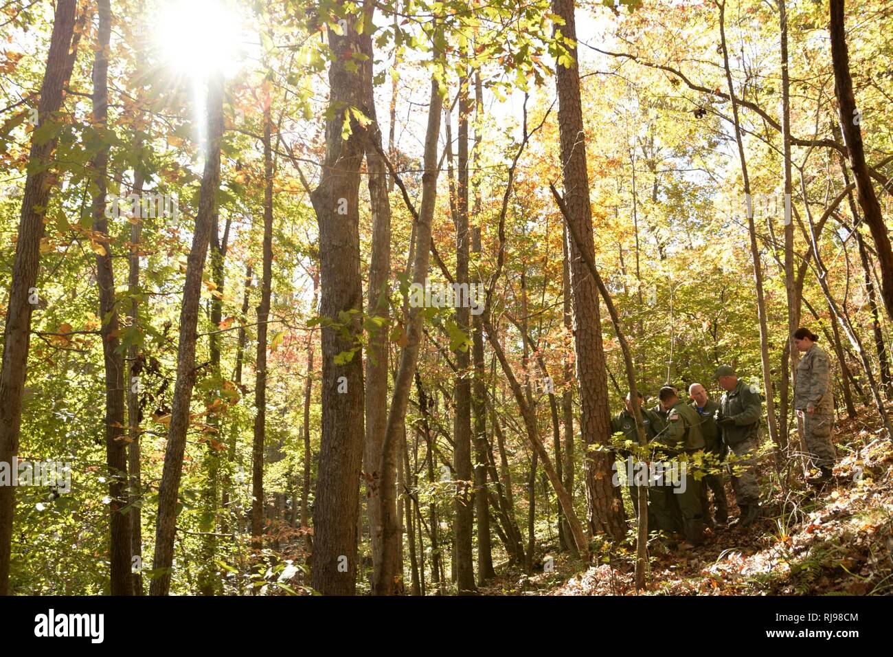 North Carolina Air National Guard members use a compass and map to ...