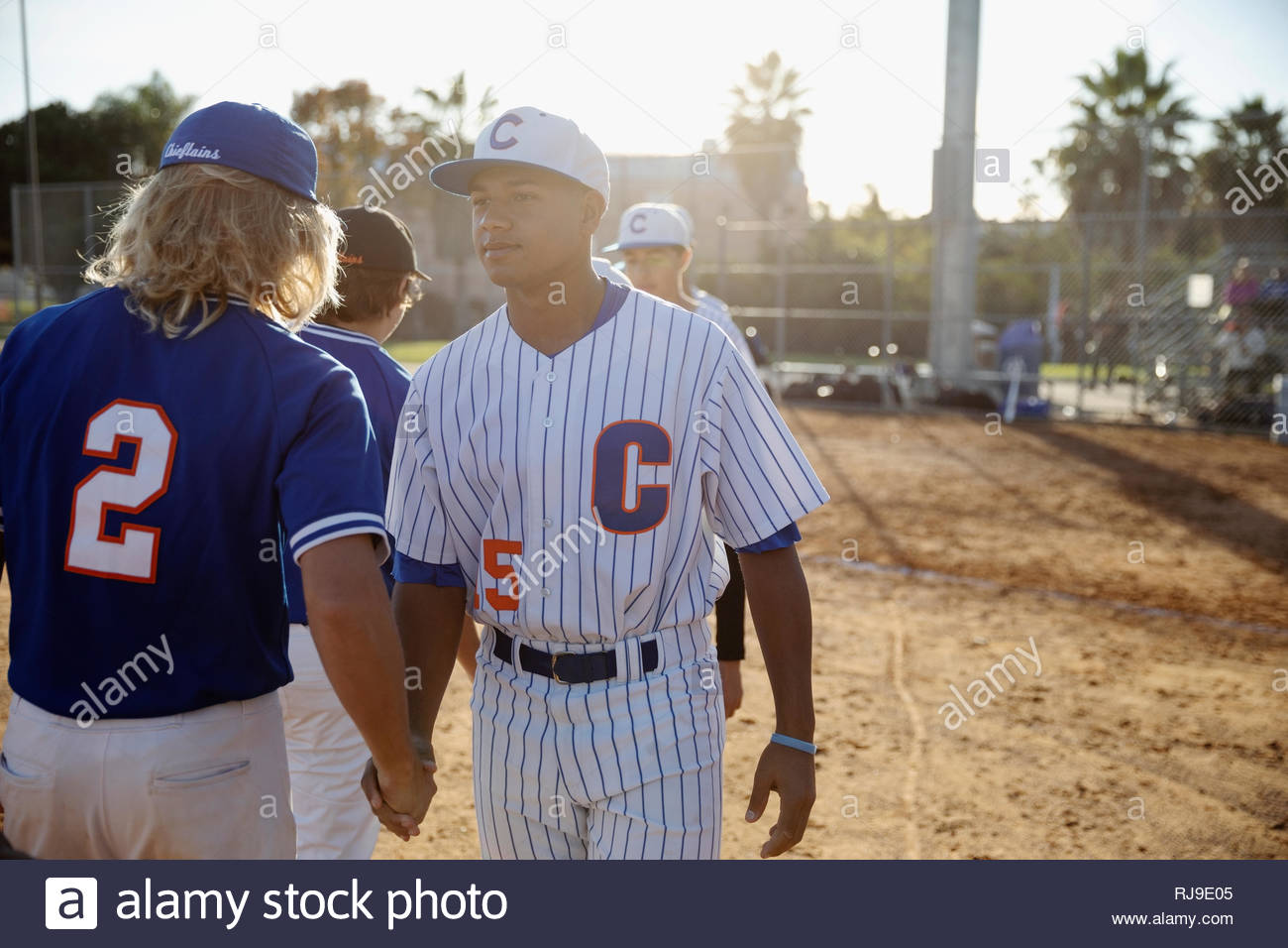 Sports team shaking hands after game hi-res stock photography and ...