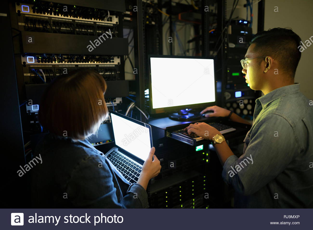 Dark room computer glowing hi-res stock photography and images - Alamy