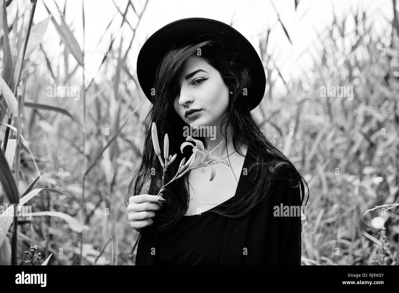 Sensual Girl All In Black Red Lips And Hat Goth Dramatic Woman Hold