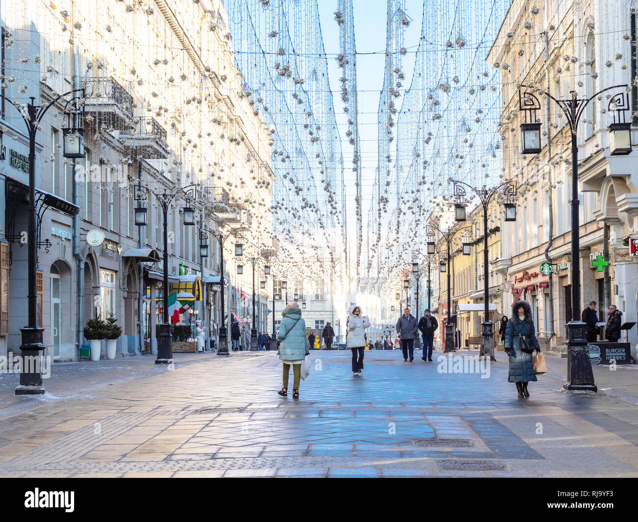 MOSCOW, RUSSIA - JANUARY 24, 2019: people walk at Xmas decorated ...