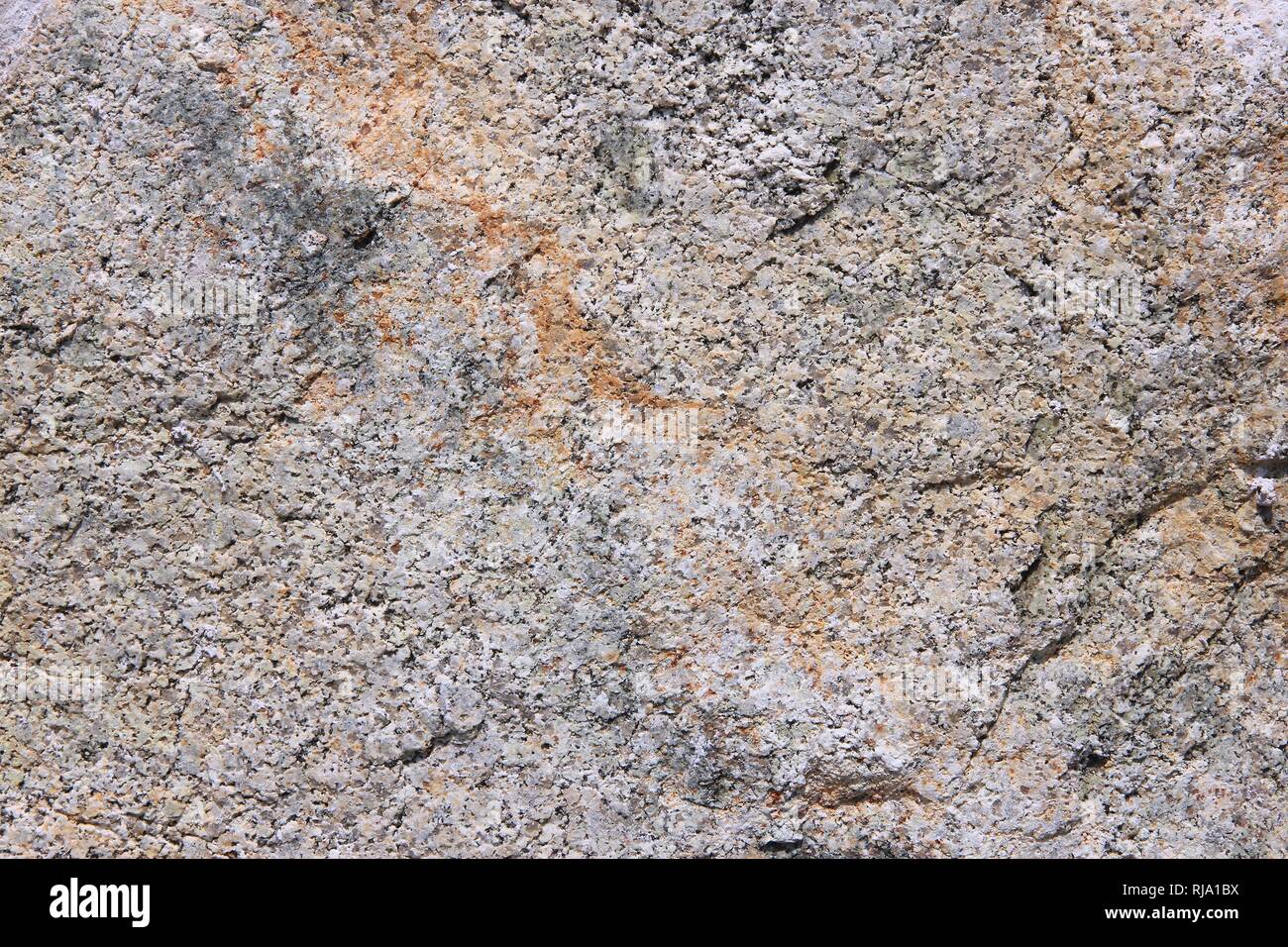 Granite stone background - solid rock wall backdrop Stock Photo - Alamy