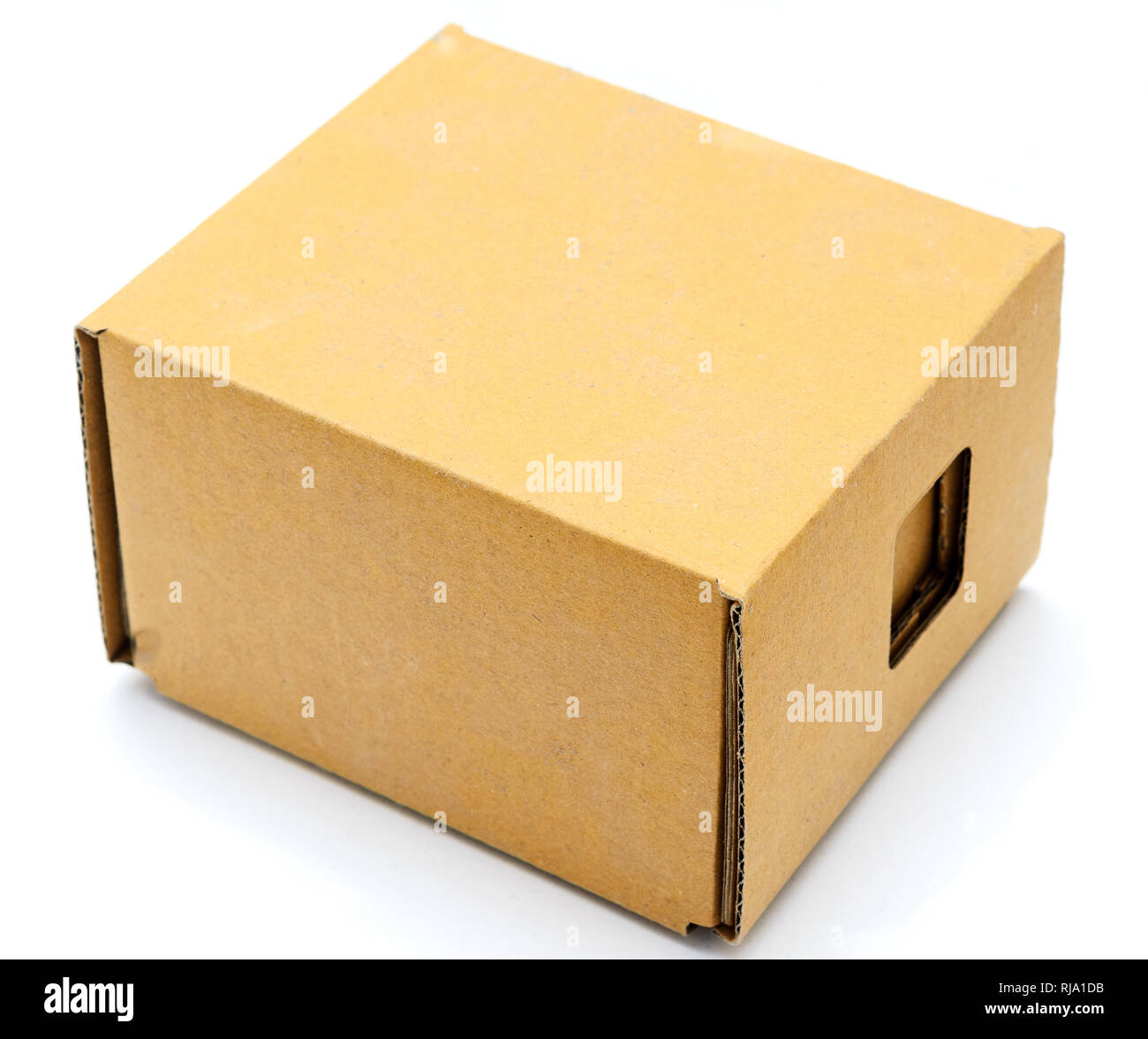 Small cardboard boxes on white background Stock Photo - Alamy