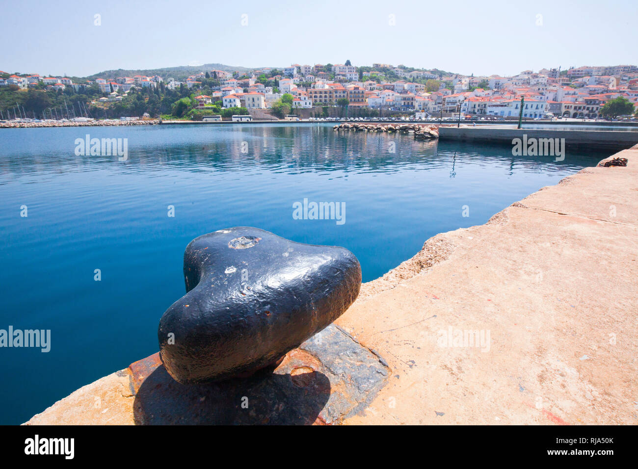 City view and bollards at the port of Pilos in Greece Stock Photo - Alamy
