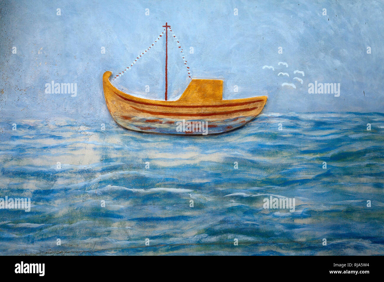 small boat on lake as a mural in Greece Stock Photo - Alamy
